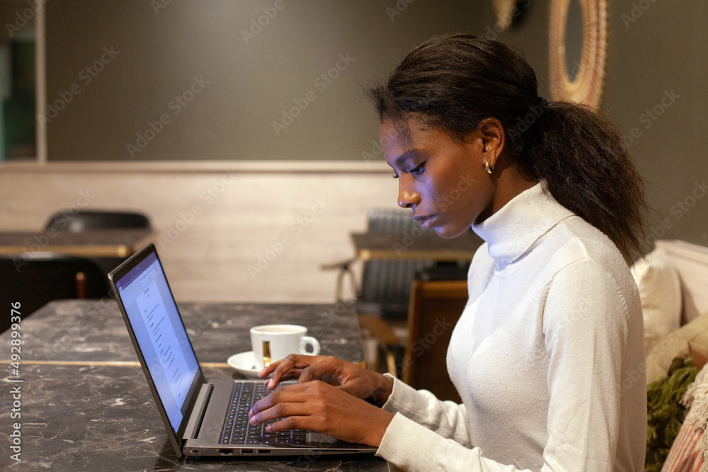 professional confident black woman working on computer Stock Photo ...