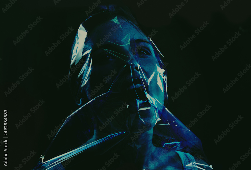 Taking her last breath. A young woman suffocating with her head wrapped ...