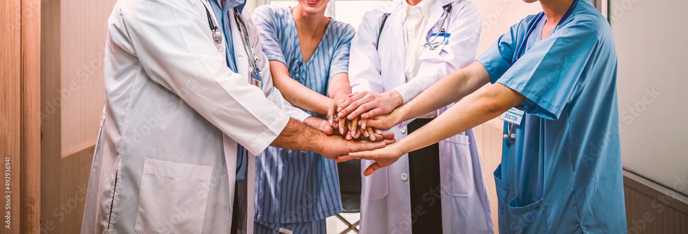 Doctors team joining hands as symbol of unity, teamwork concept. Stock ...