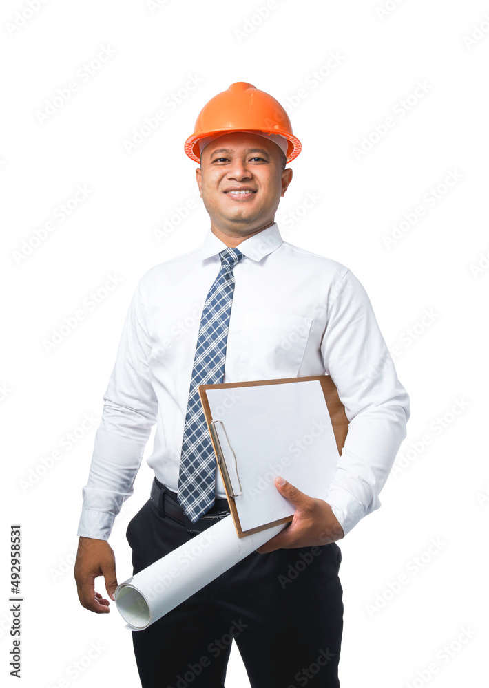 Young engineer or architect standing holding blueprints and clipboard ...