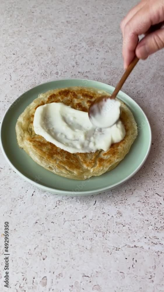 Step by Step Paratha Sandwich with garlic yogurt, fried eggs, crispy ...