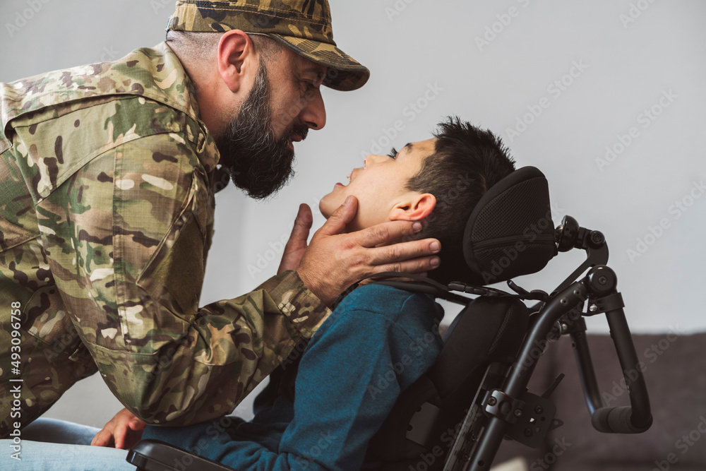 Soldier father says goodbye to his wheelchair-bound disabled son before ...