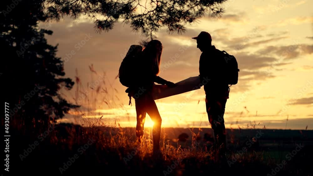 Family tourism with map in forest. Team orienteering in forest. Family ...