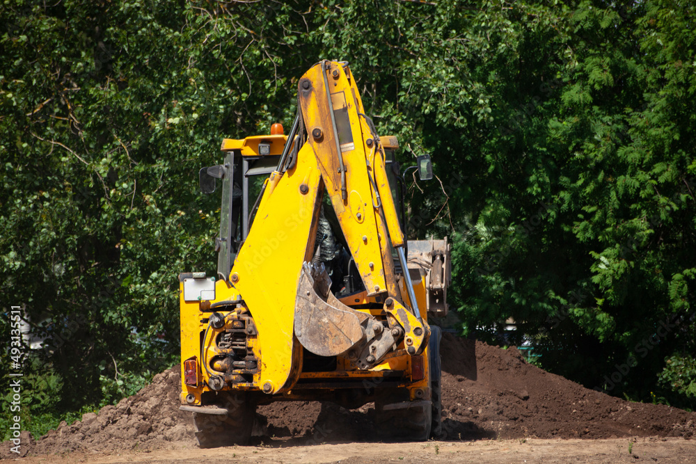 Heavy machinery for construction. Excavator levels ground. Preparation ...