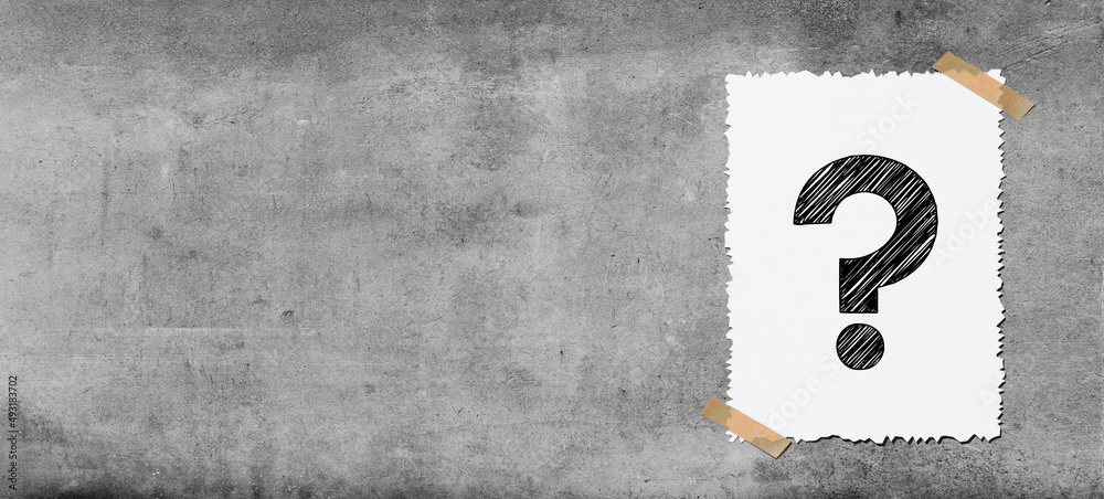 Note paper with question mark on textured concrete wall background ...