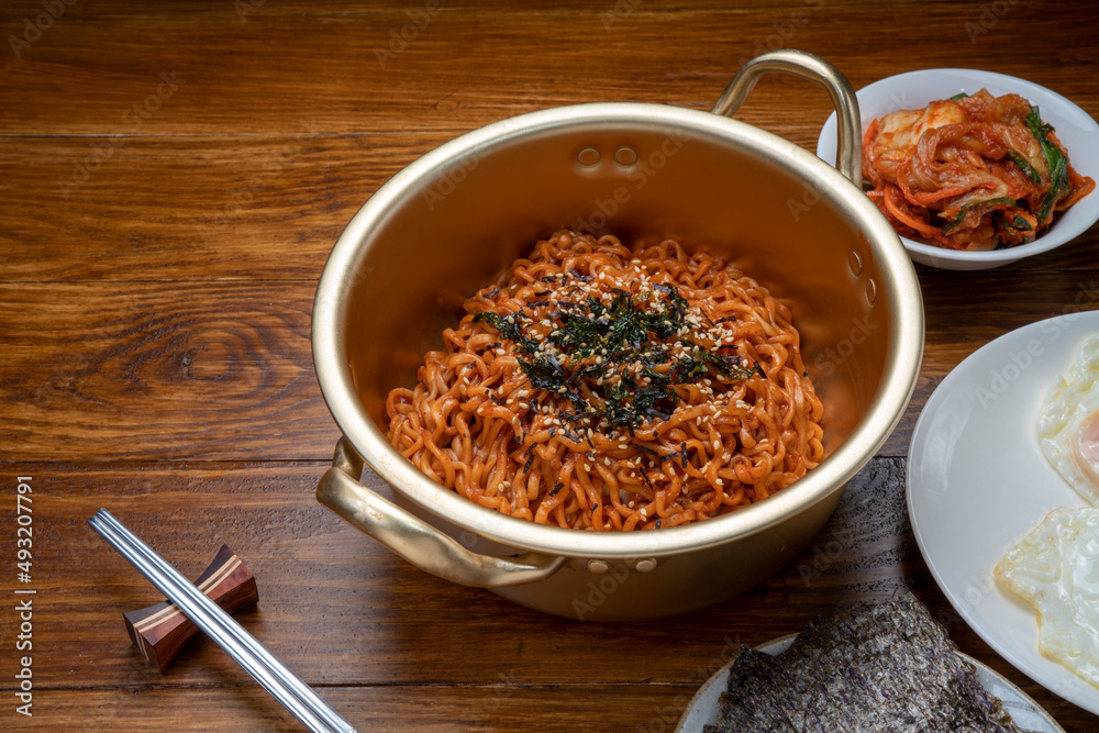 Korean traditional Ramyeon noodle in a traditional korean noodle pot ...