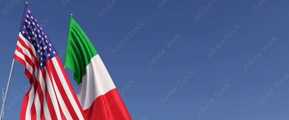Flags of the USA and Italy on flagpoles on side. Flags on a blue ...