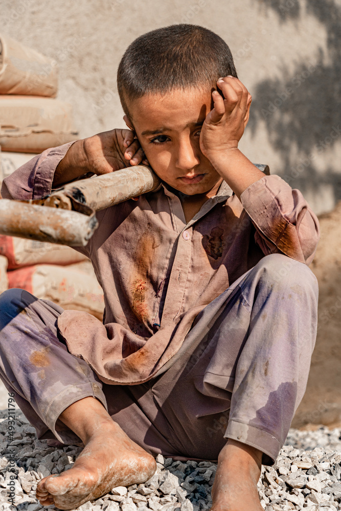 poor by playing it the park with sad face expressions Stock Photo ...