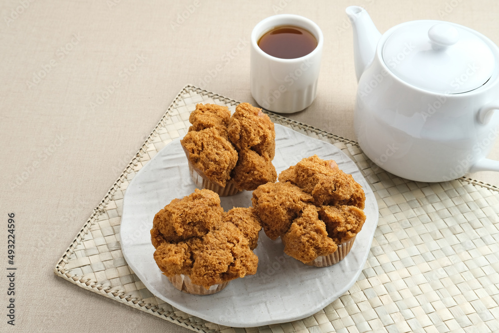 Bolu Kukus Gula Jawa (brown sugar steamed sponge cake), a traditional ...