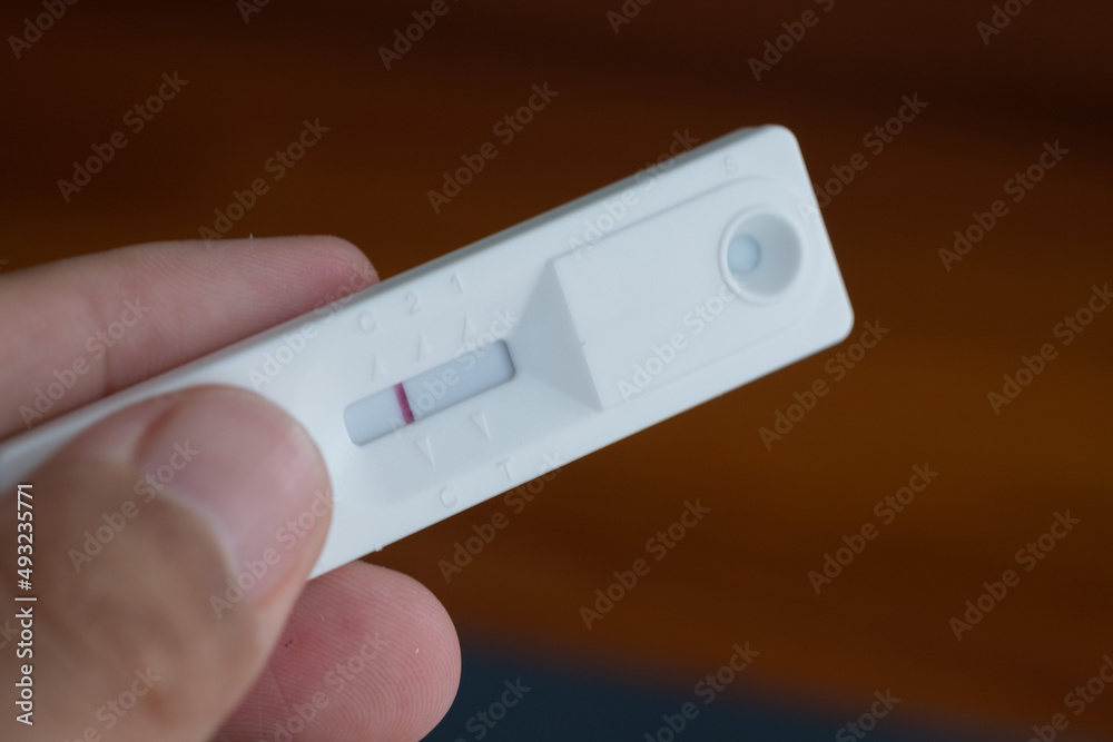 covid-19 negative test result with antigen rapid test kit (ATK), The ...