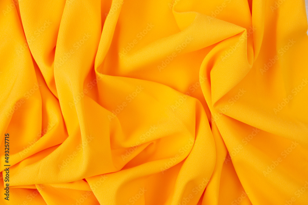 Texture of yellow fabric. Background with folds. Close-up. Stock Photo ...