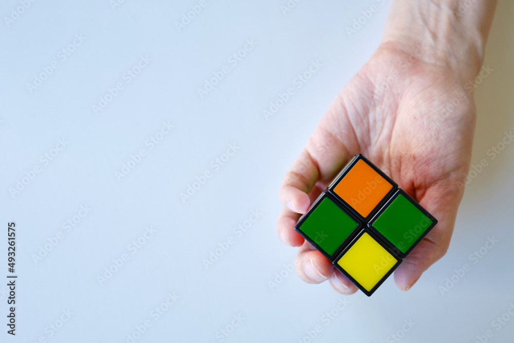 Ukraine, Kyiv - March 17, 2022: Rubik's cube colored in hands on a ...