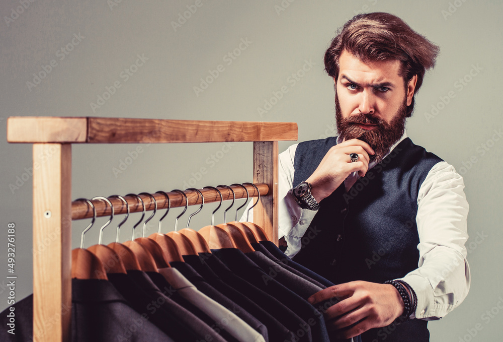 Men clothing, boutiques. Tailor, tailoring. Stylish men's suit. Man ...