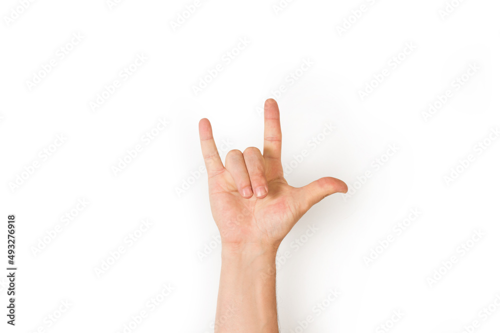 Foto de Mano de hombre gesticulando un simbolo sobre fondo blanco liso ...