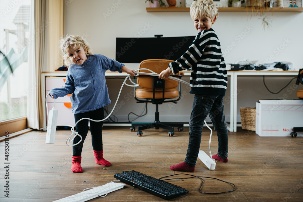 Kids playing with different kinds of electronic devices Stock Photo ...
