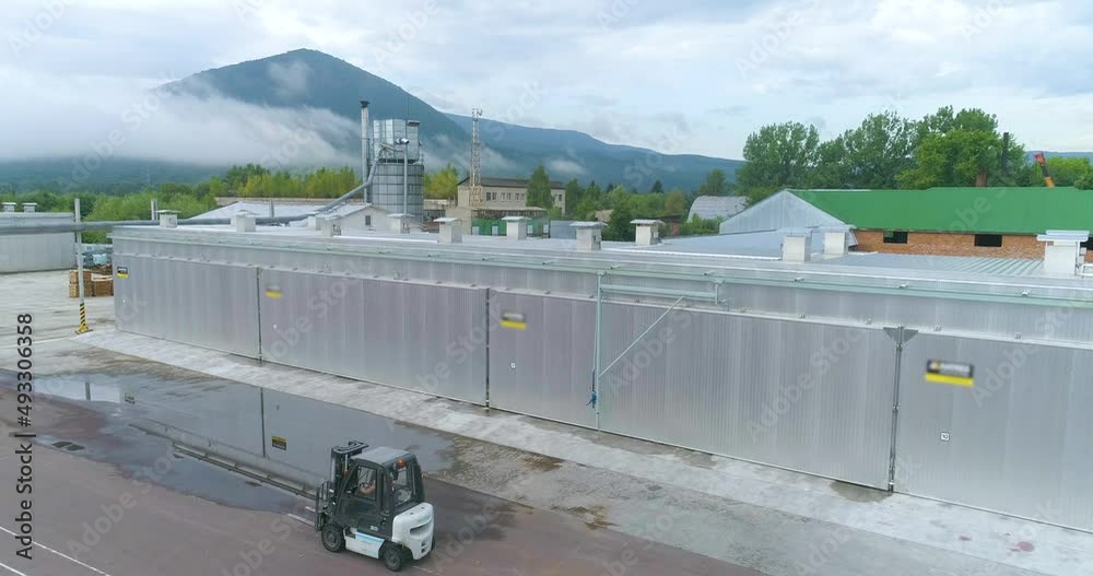 Modern drying chambers at a woodworking plant. Industrial exterior ...