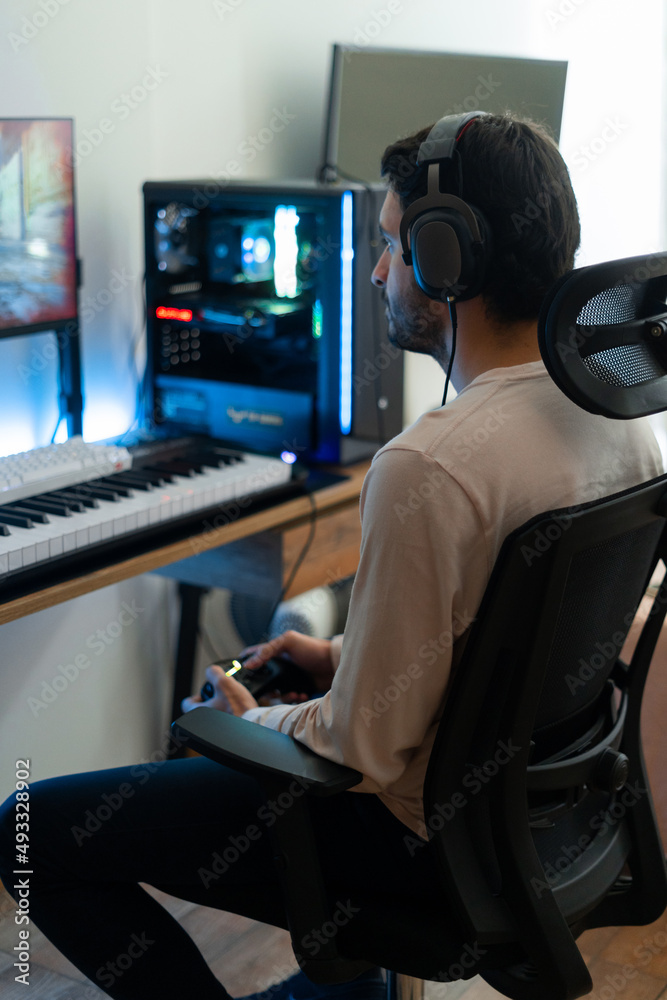 Playing video games on pc Stock Photo | Adobe Stock