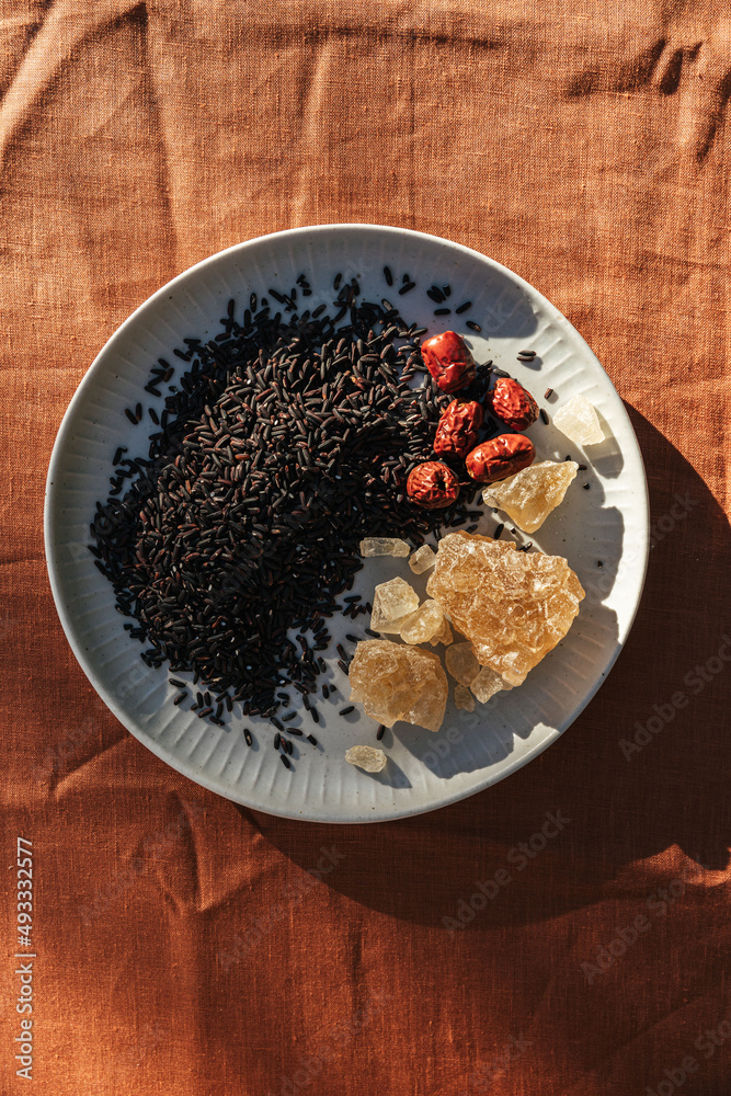 Purple rice with jujube dates and rock sugar Stock Photo | Adobe Stock