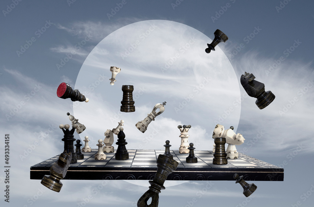 Chess pieces and chess board on sky background Stock Photo | Adobe Stock