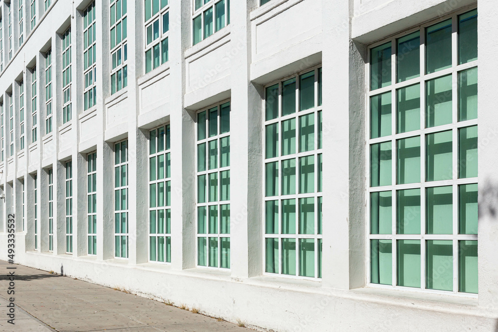 vanishing point of a white building Stock Photo | Adobe Stock