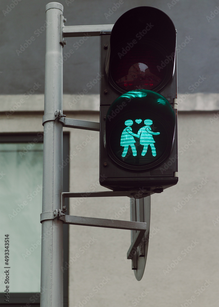 Traffic light of Vienna, with two girls holding hands Stock Photo ...