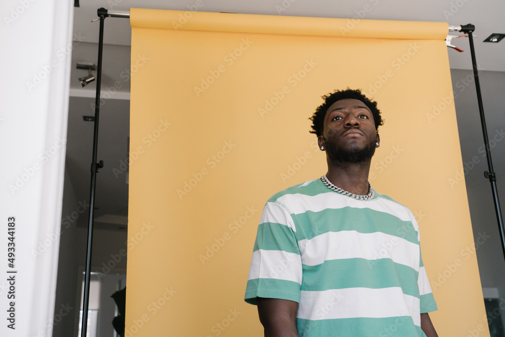 Male Model In Front Of Studio Background Stock Photo | Adobe Stock