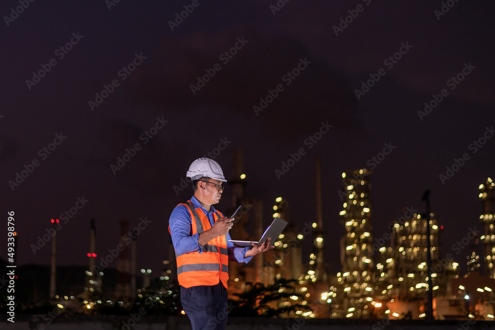 Engineer wearing uniform, white helmet standing hold detail laptop ...