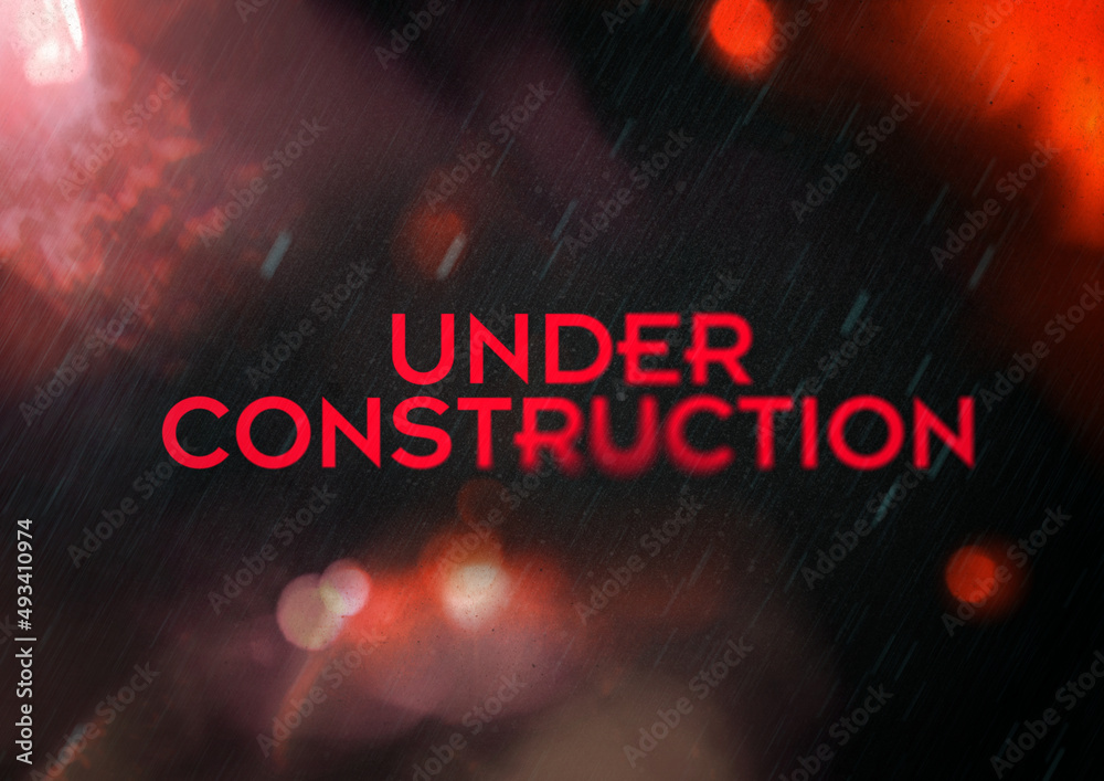 Under construction title, grunge style with grain and partial blur ...