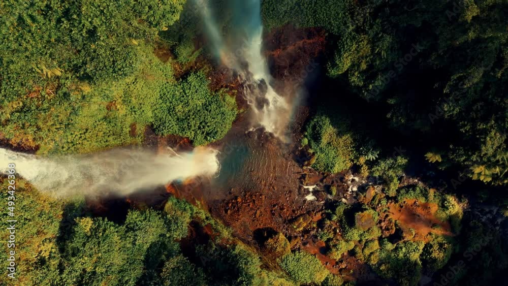 Waterfall hidden in tropical rainforest jungle on nature background 4K ...