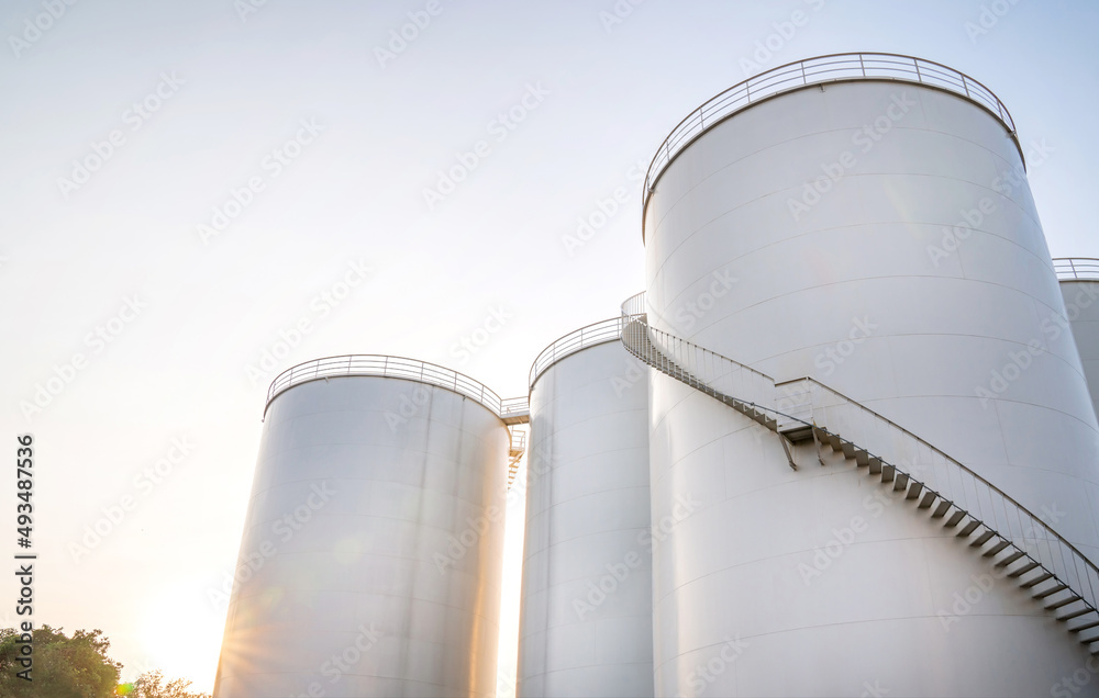 Curved stairway of base oil storage tank in the petroleum factory with ...