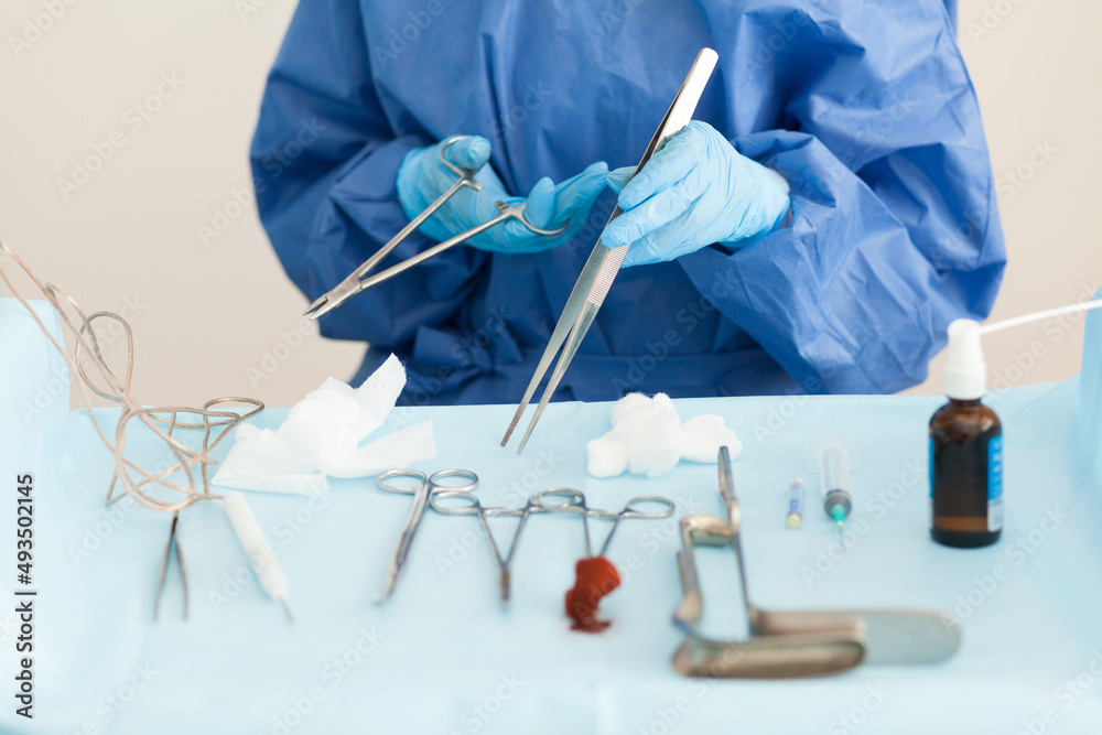 Sterile curettage instruments, forceps, retractor in the operating room ...