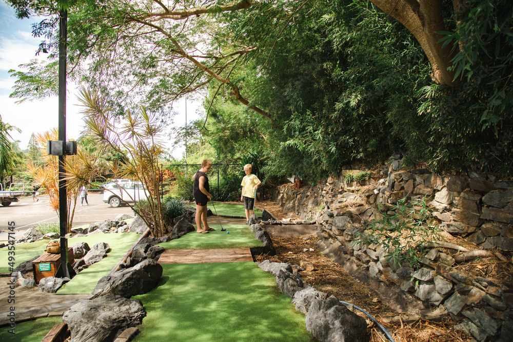 Kids playing mini golf at the Big Banana fun park, Coffs Harbour ...