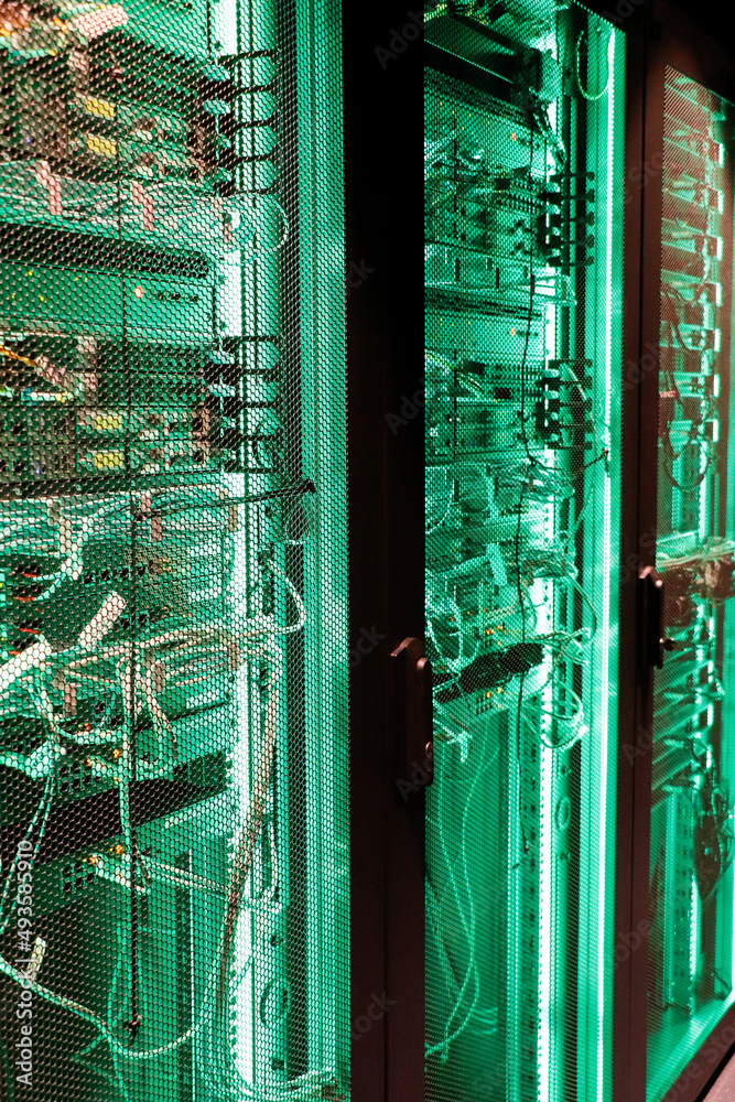 Fotografia do Stock: Data Center With Multiple Rows of Fully ...