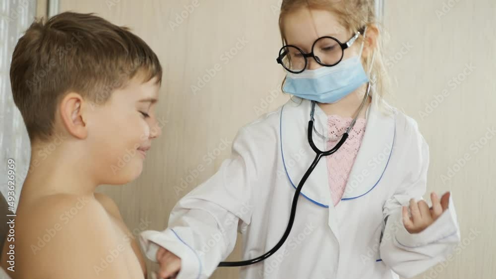 teen brother and sister play in the hospital playing the roles of a ...