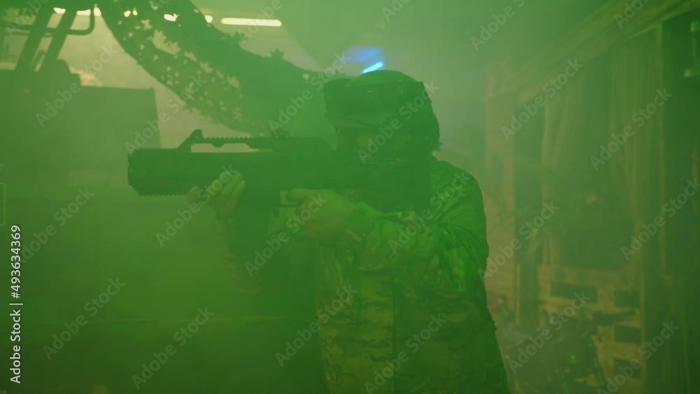 Vidéo Stock 4k Side view of portrait of special force soldier or laser ...