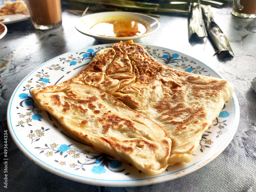 Traditional Malaysian Signature Flatbread Food Is Called Roti Canai