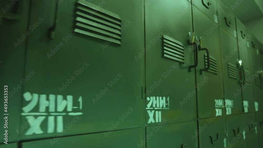 4k Close up Dolly shot of green colored metallic military Locker Room ...