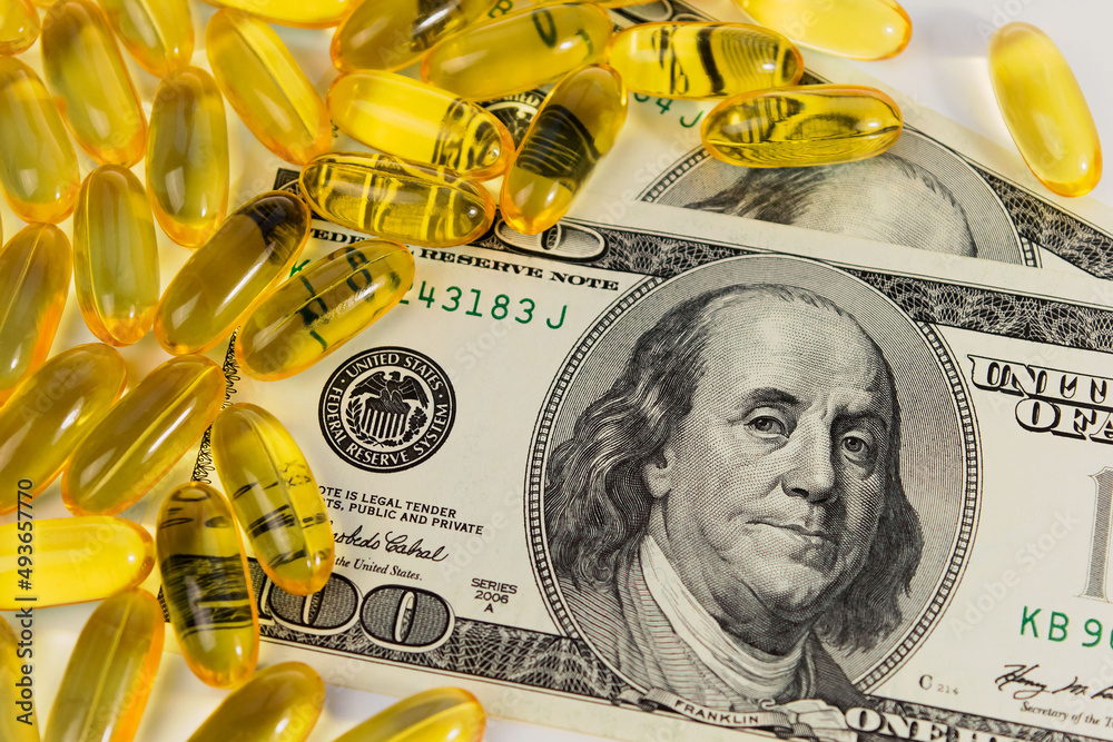 Soft gel yellow capsules omega 3, fatty acid fish oil on hundred dollar ...