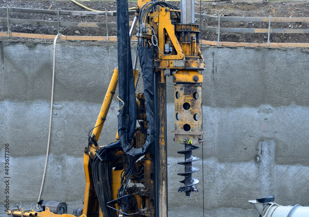 the drilling rig with a pipe drill drills holes for concreting the ...
