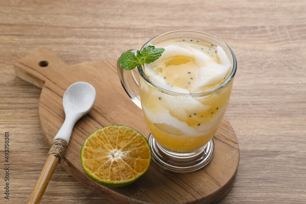 Es Kelapa Jeruk, a typical Indonesian drink made from fresh oranges ...