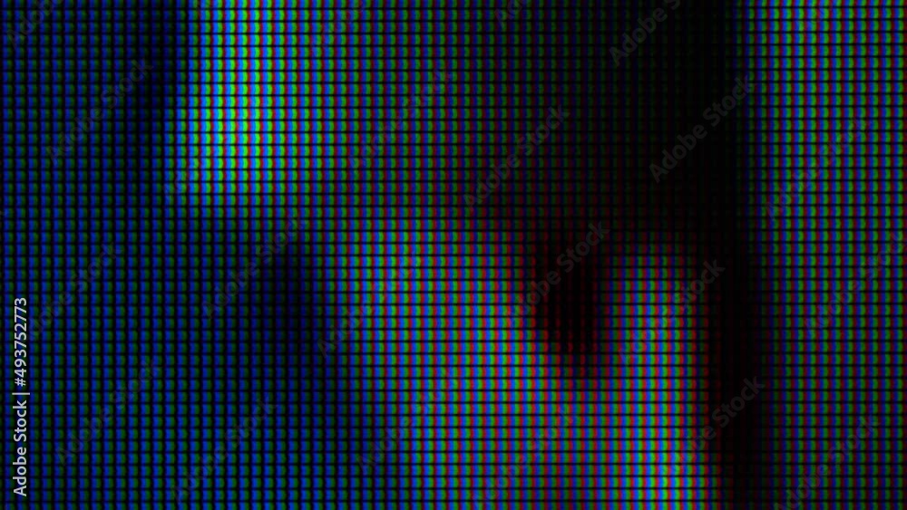 Extreme macro view of LED matrix, monitor or TV screen, broadcasting ...