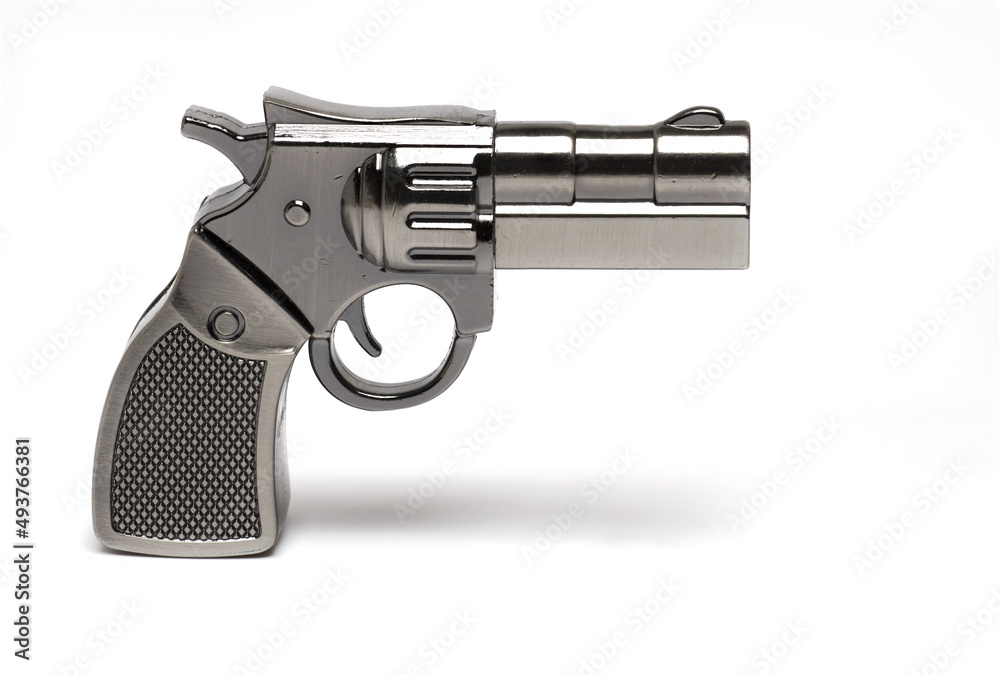 Closeup toy gun revolver shadow white background Stock Photo | Adobe Stock