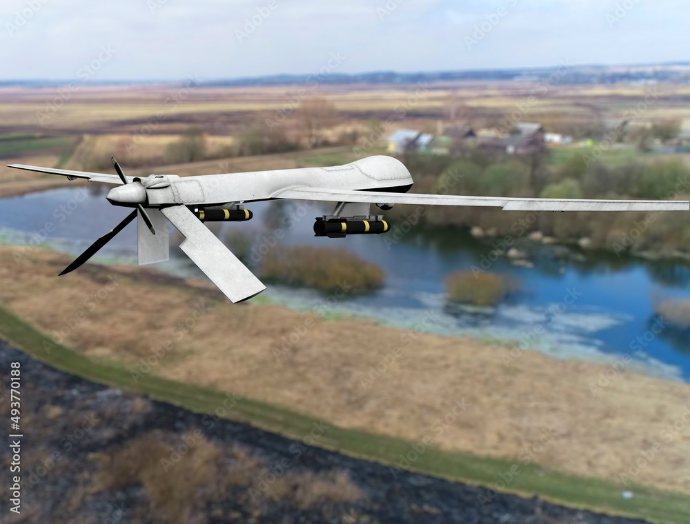 Military combat reconnaissance drone armed with missiles on the ...