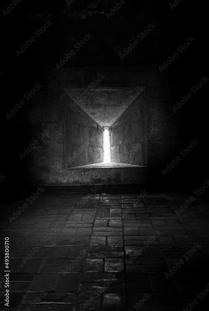 Dramatic dark low light black and white image of inside Fortaleza Ozama ...