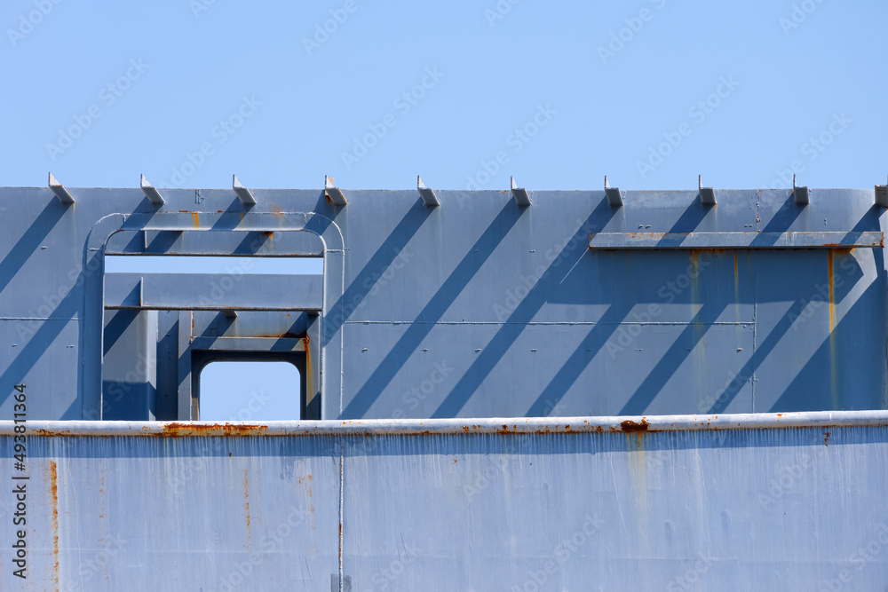 Part of navigation bridge room structure on the old gray vessel hull ...