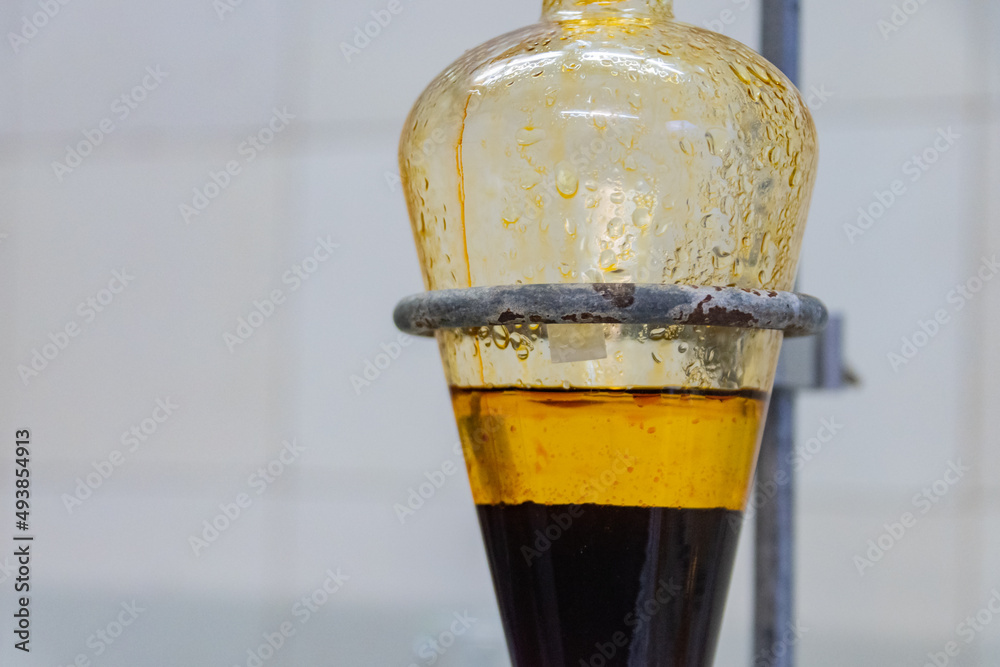 Liquid-liquid extraction Stock Photo | Adobe Stock