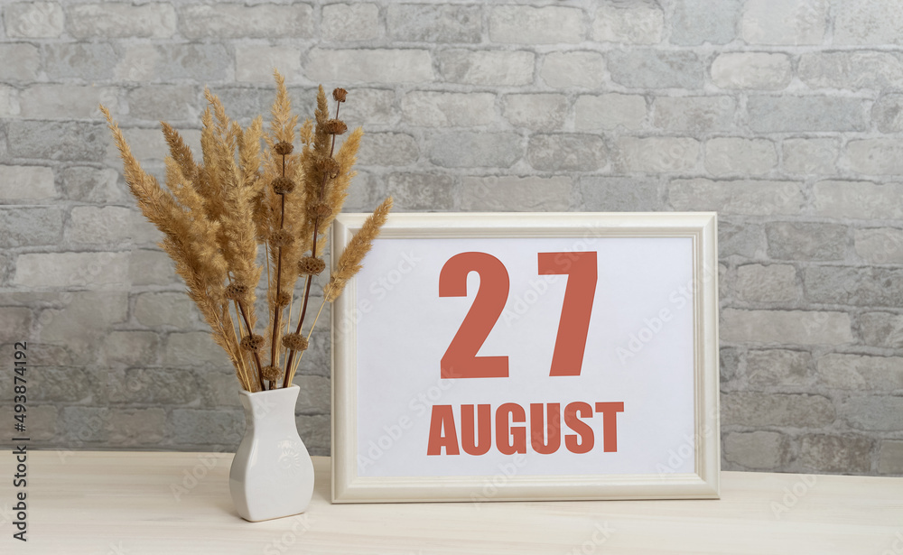 august 27. 27th day of month, calendar date. White vase with ikebana ...