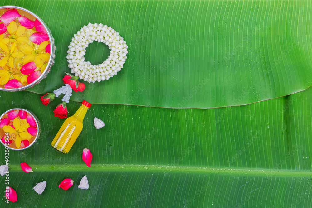 Songkran Festival background with jasmine garland Flowers in a bowl of ...