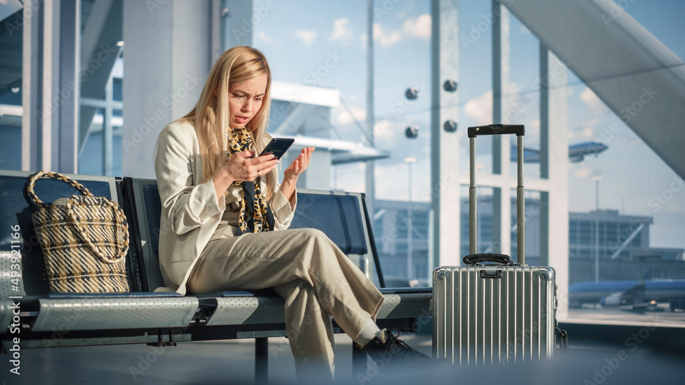 Airport Terminal: Woman Waits for Flight, Uses Smartphone, Receives ...