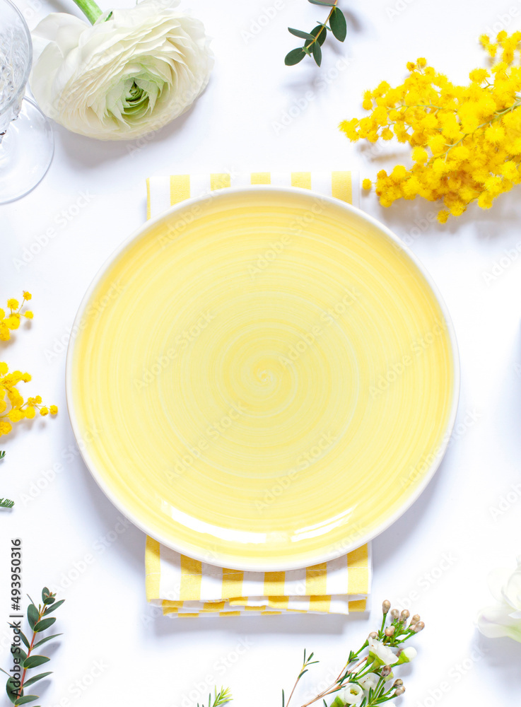 Spring floral table settings with spring flowers. Top view empty plate ...